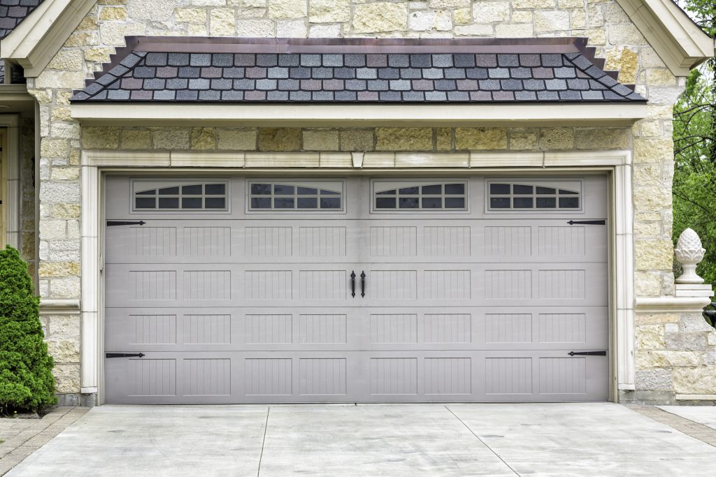 Traditional Two Car Garage With Windows And Grey Panels Aaa American